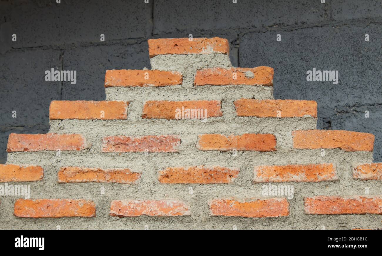 Striped brick walls is used as the background Stock Photo - Alamy