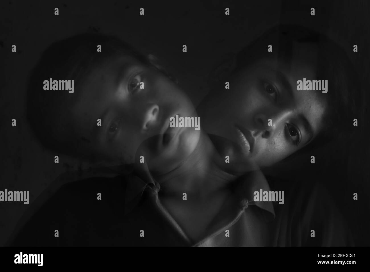 Dramatic portrait of a boy. Portrait of a sad boy. slow shutter speed ...