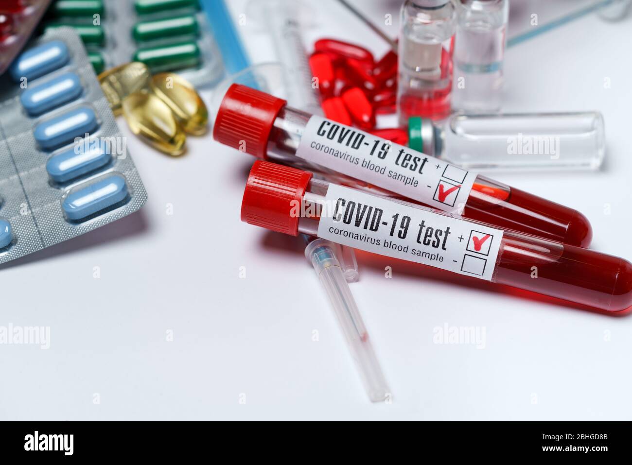 blood test tubes and packings of pills and capsules of medicine Stock ...
