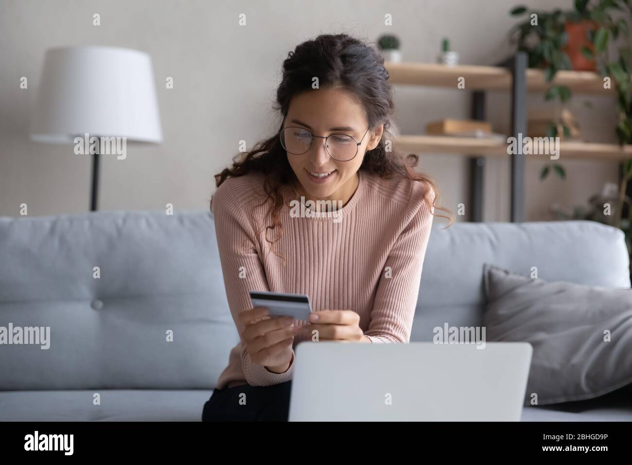 Smiling beautiful lady planning vacation, booking hotel online Stock ...