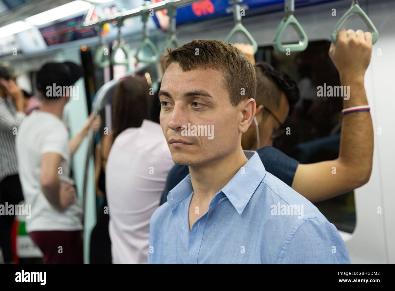 People go to work in public transport Stock Photo - Alamy