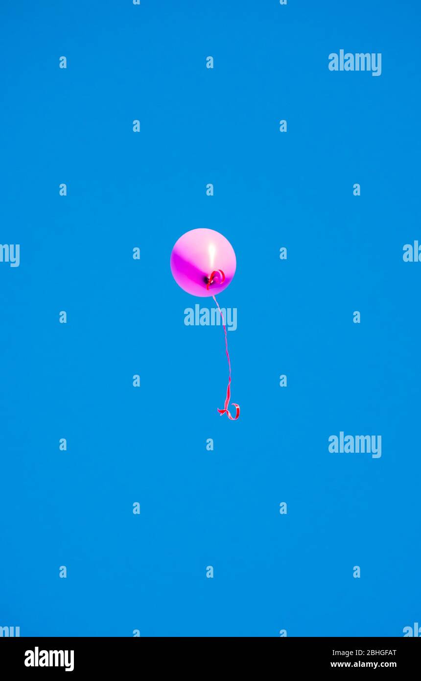 Red balloon message in sky hi-res stock photography and images - Alamy