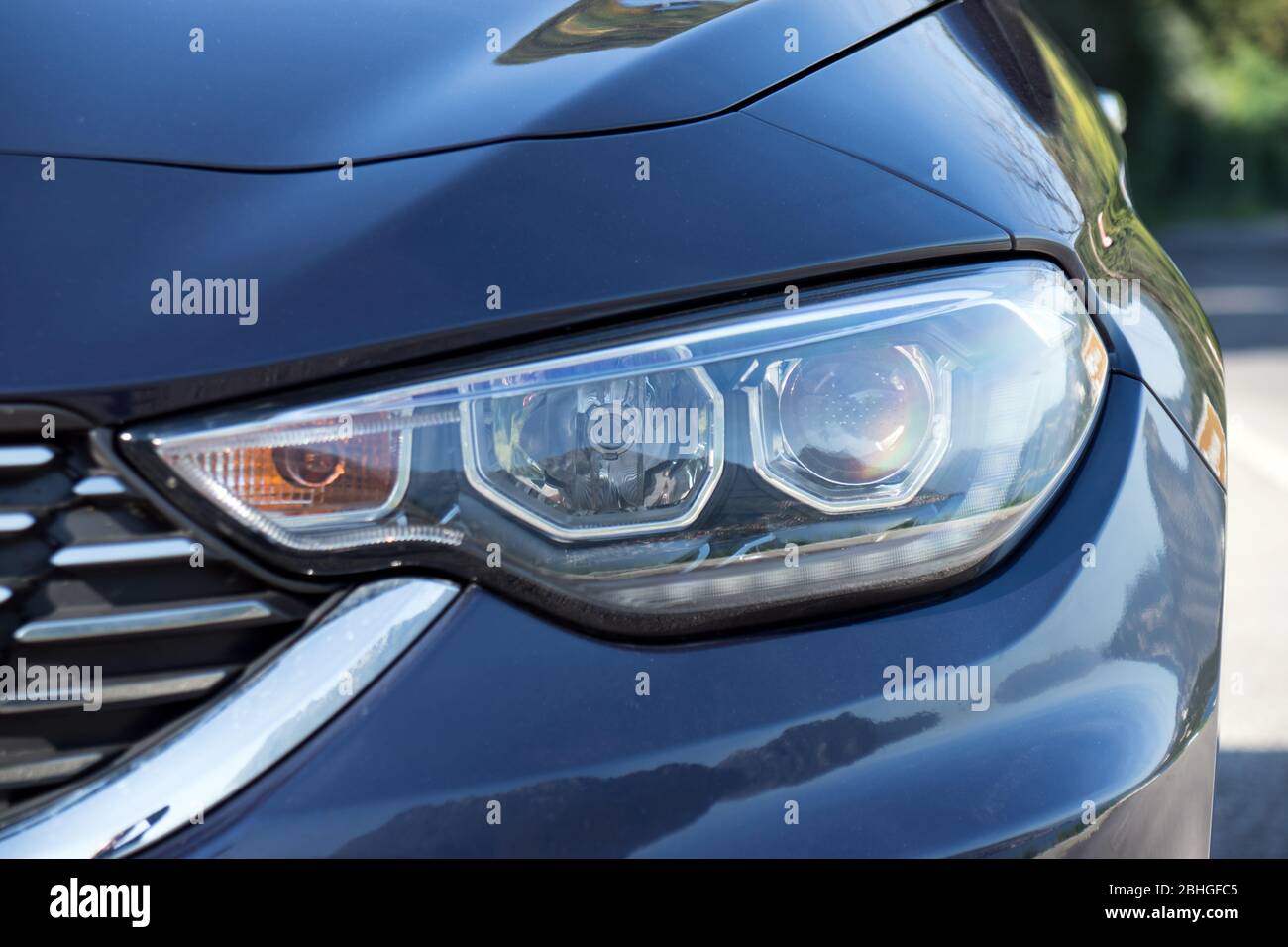 Front light of a modern car Stock Photo - Alamy