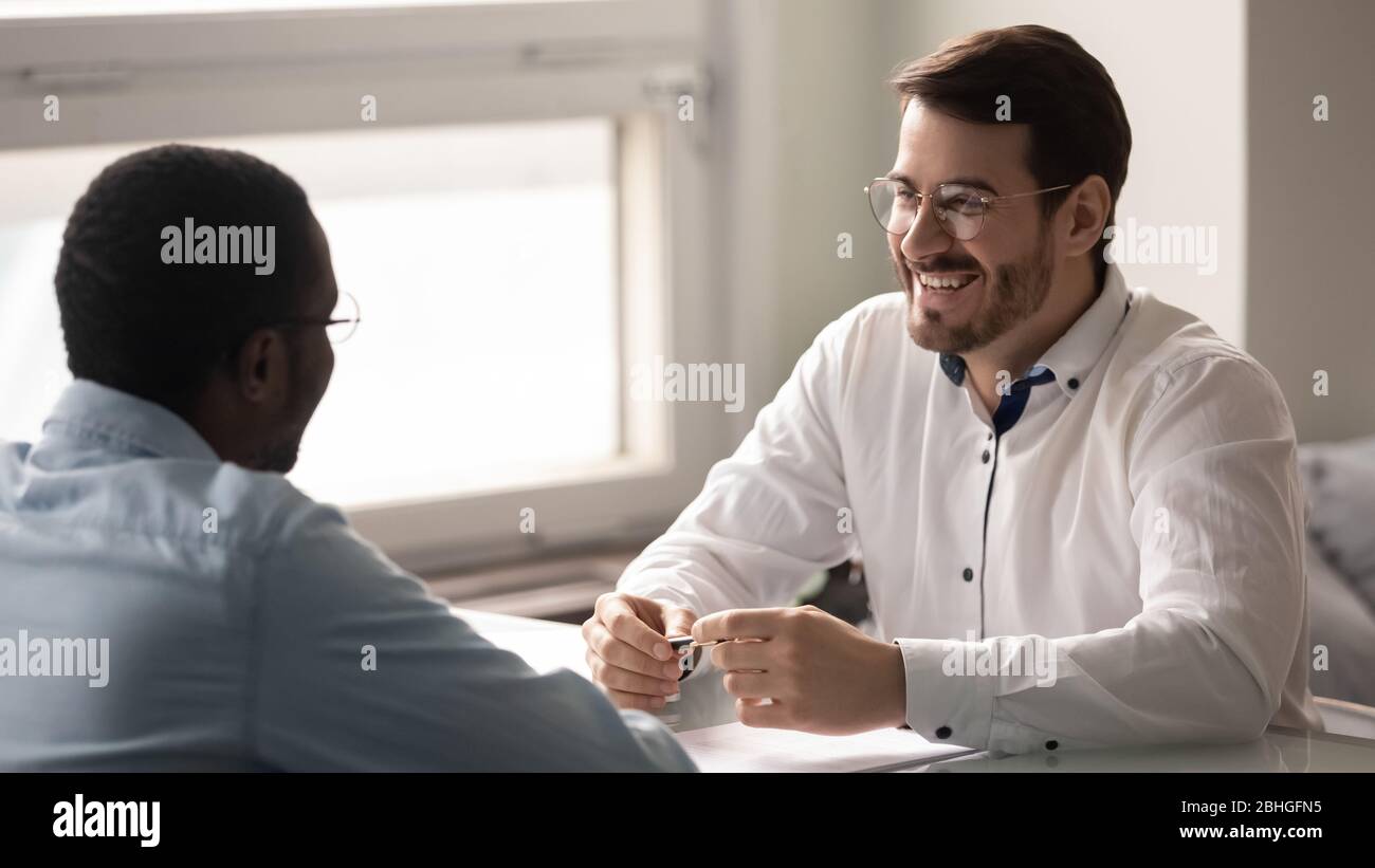 Happy ethnic worker hi-res stock photography and images - Alamy