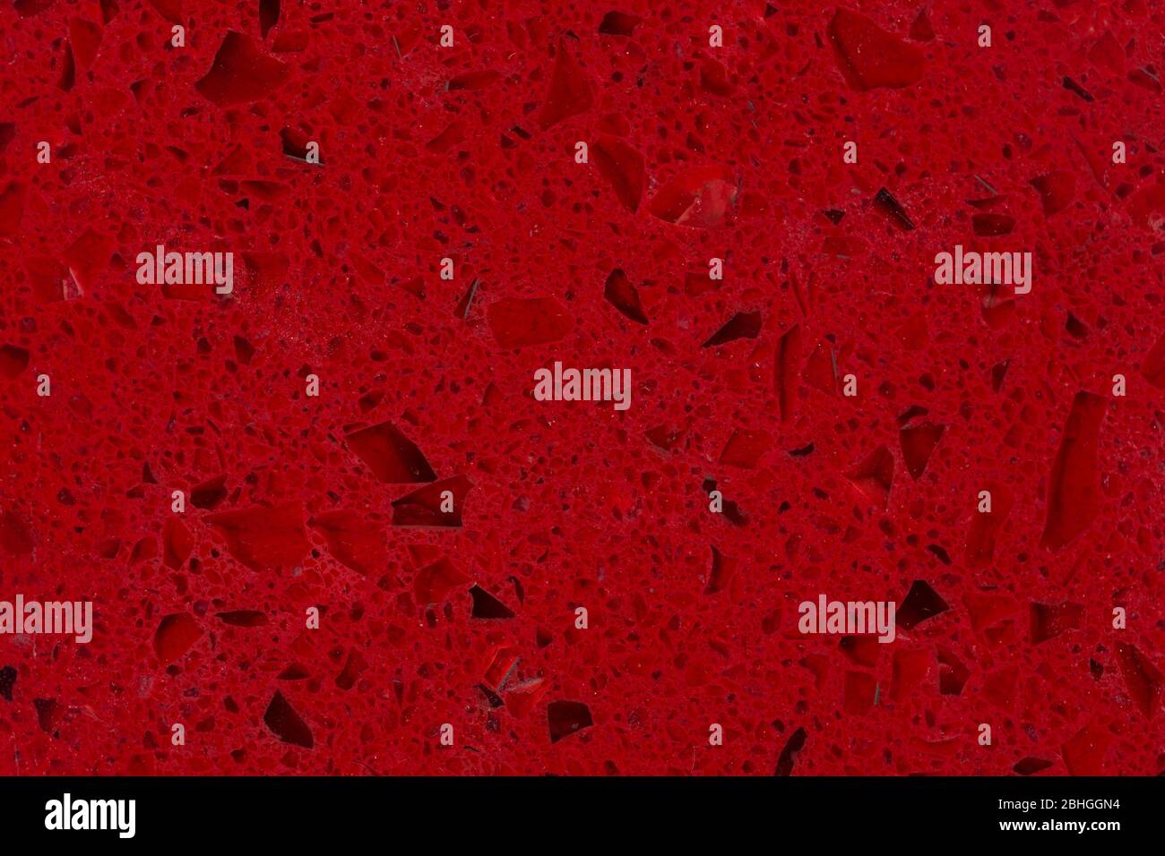 Red artificial stone detail with vignete. Can be used as background in ...