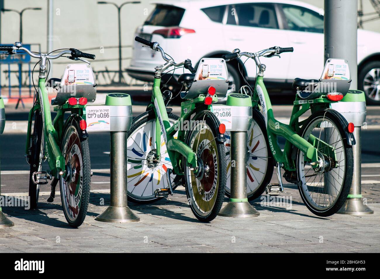 Tel Aviv Israel June 10, 2019 View of green electric bicycles to hire ...