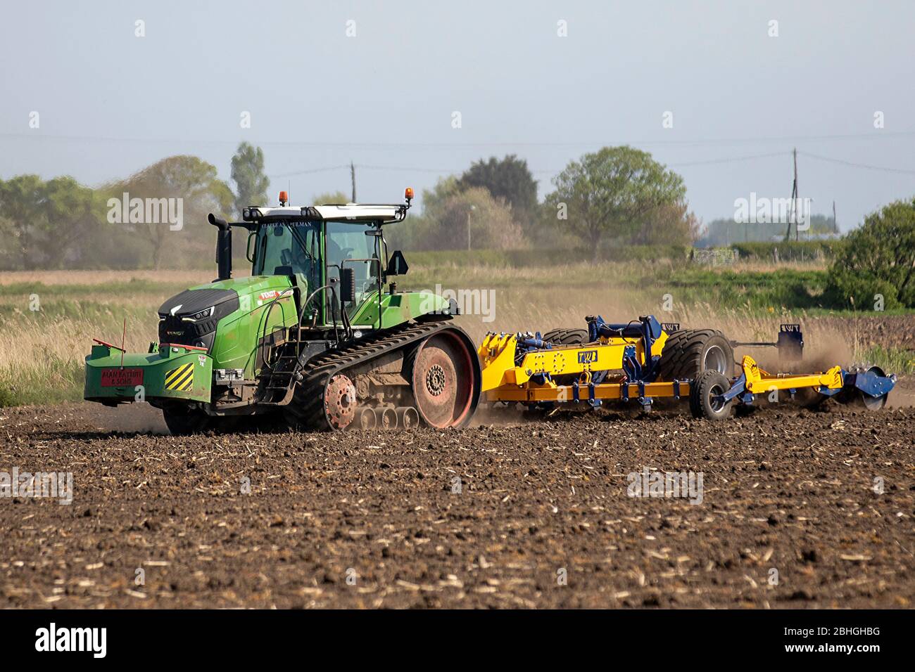 Fendt tracked crawler tractor towing TWB Tillage Equipment; Harrowing ...
