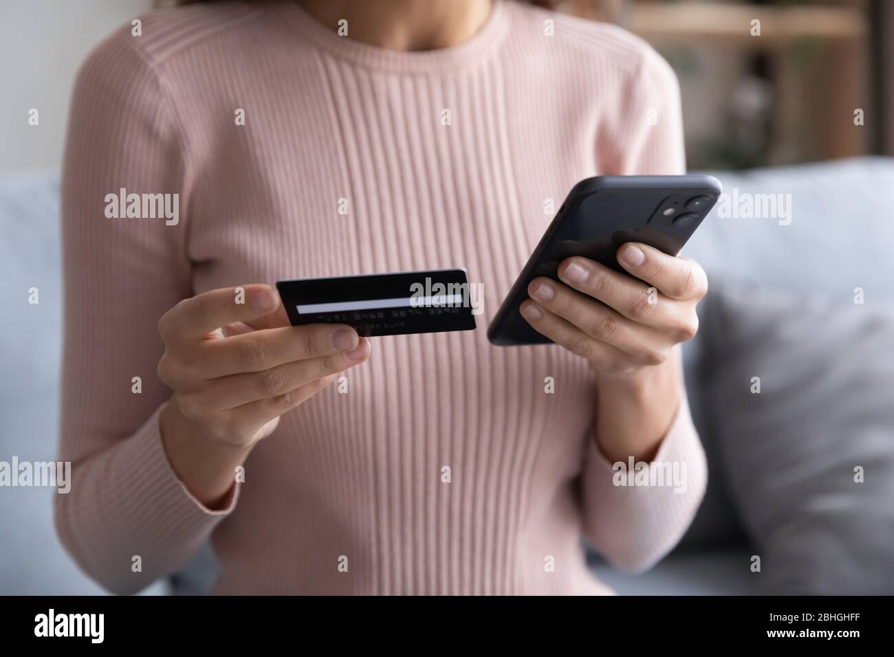Female client using e-banking application on smartphone Stock Photo - Alamy