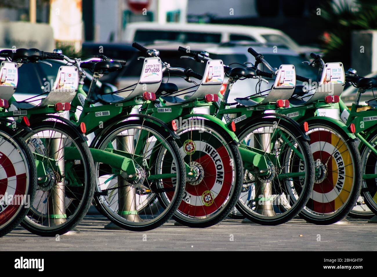 Tel Aviv Israel June 10, 2019 View of green electric bicycles to hire ...
