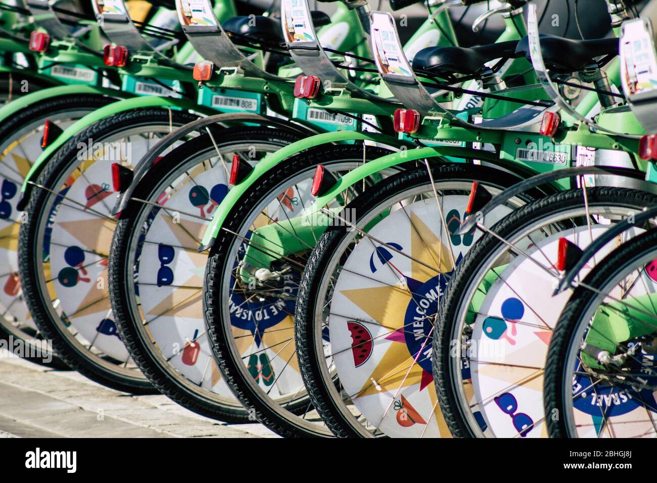 Tel Aviv Israel June 10, 2019 View of green electric bicycles to hire ...