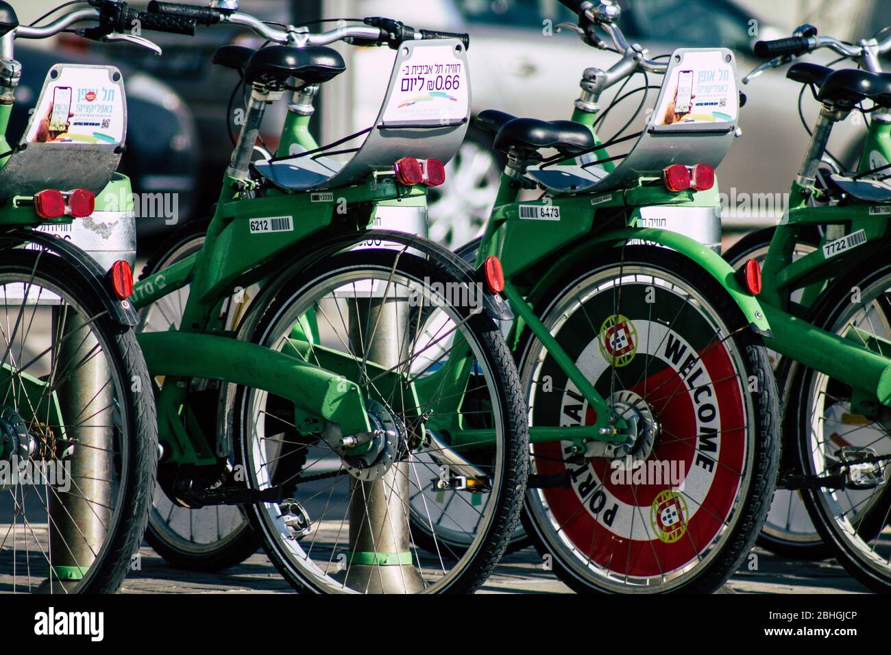 Tel Aviv Israel June 10, 2019 View of green electric bicycles to hire ...