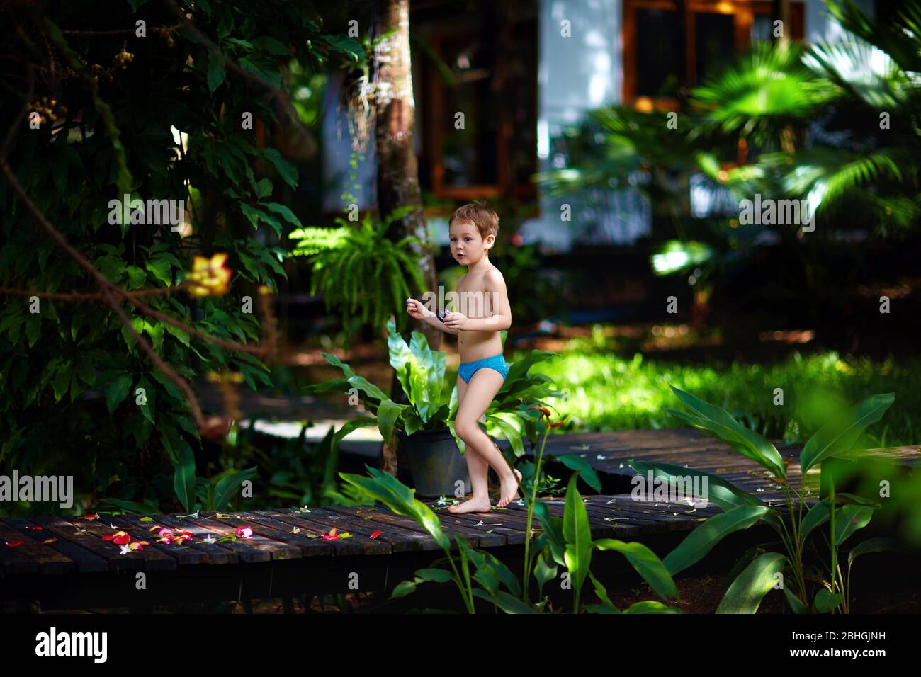 Boy walking along path in hi-res stock photography and images - Alamy
