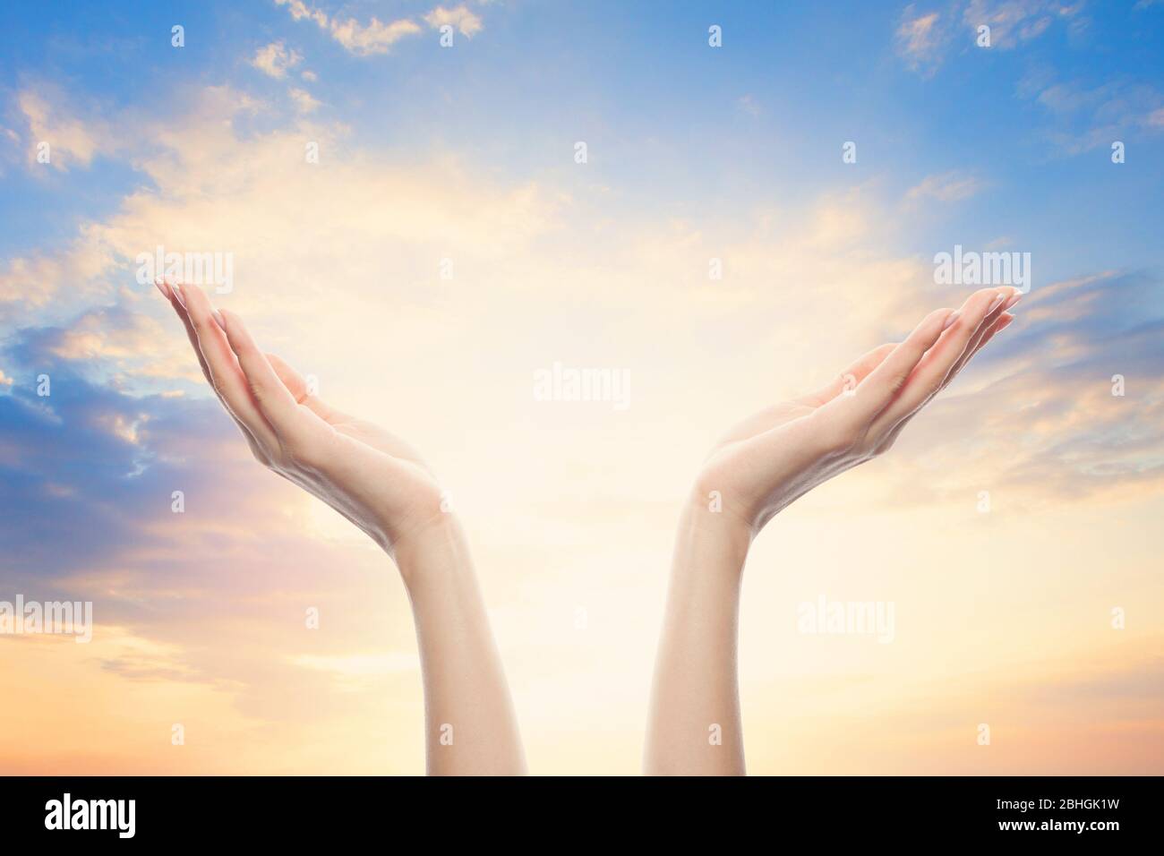 Hope reach hands blue sky hi-res stock photography and images - Alamy