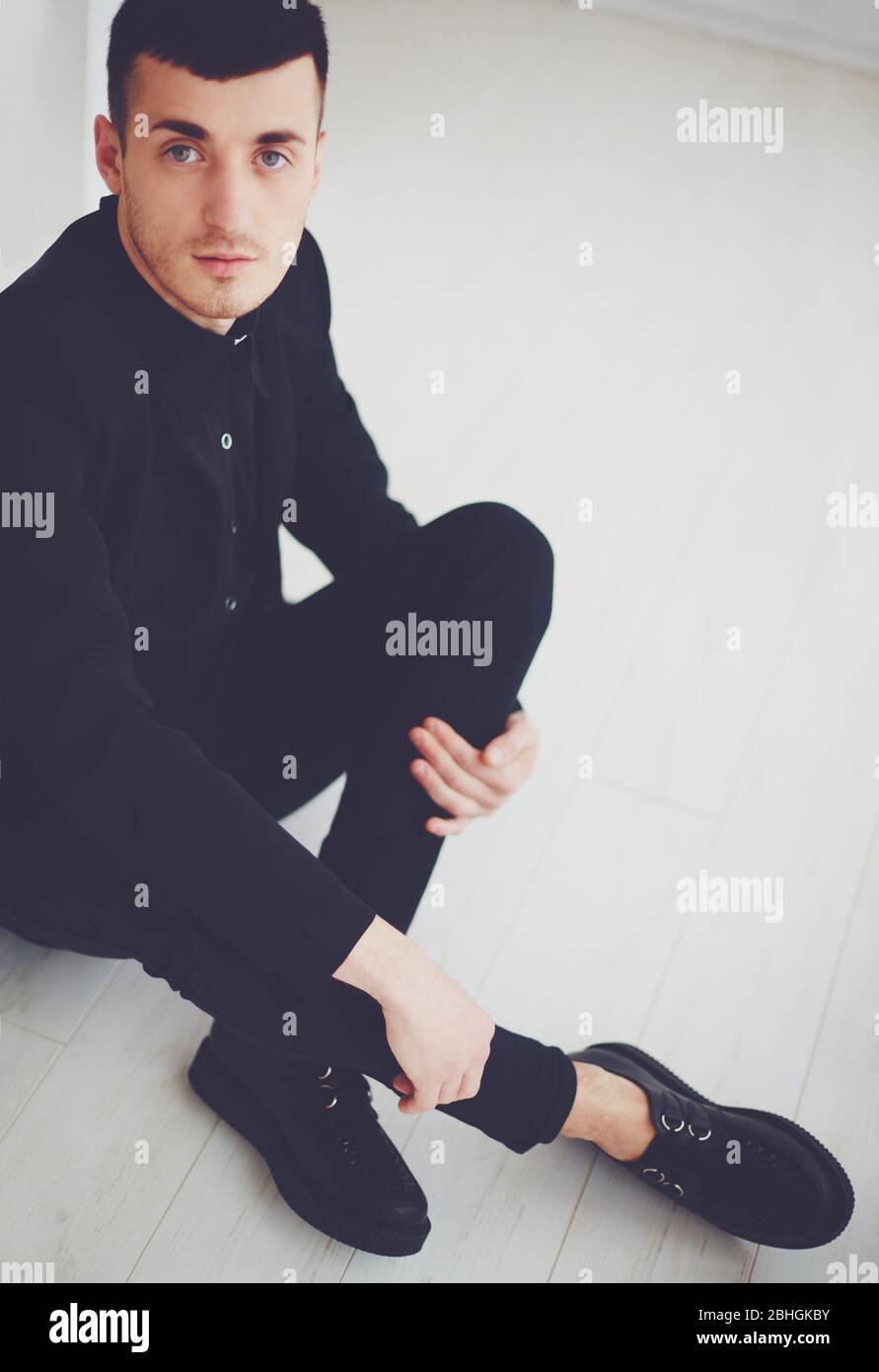 Dark clothes hi-res stock photography and images - Alamy