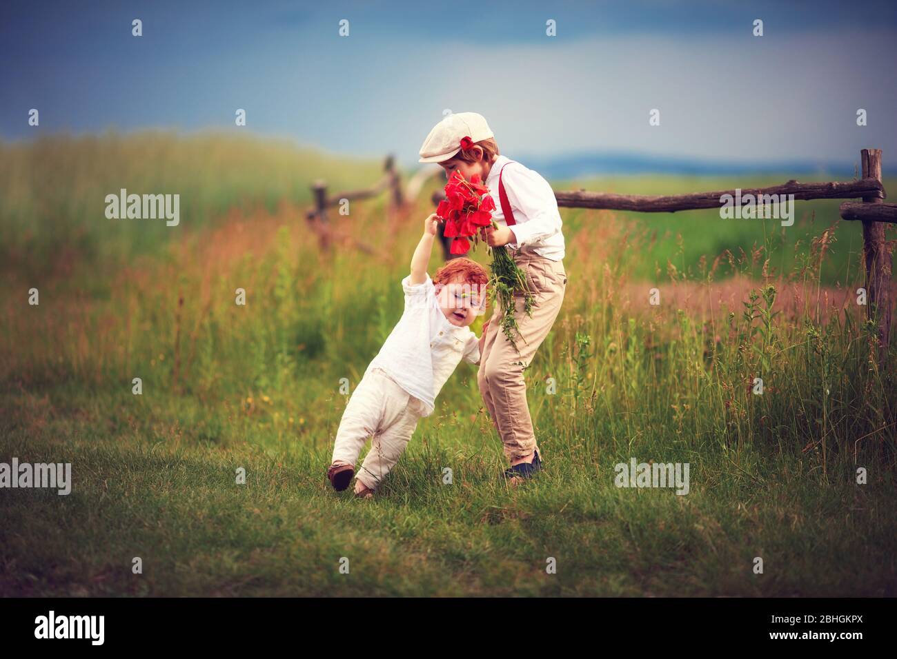 funny moment of infant baby boy trying to make his first steps with the ...