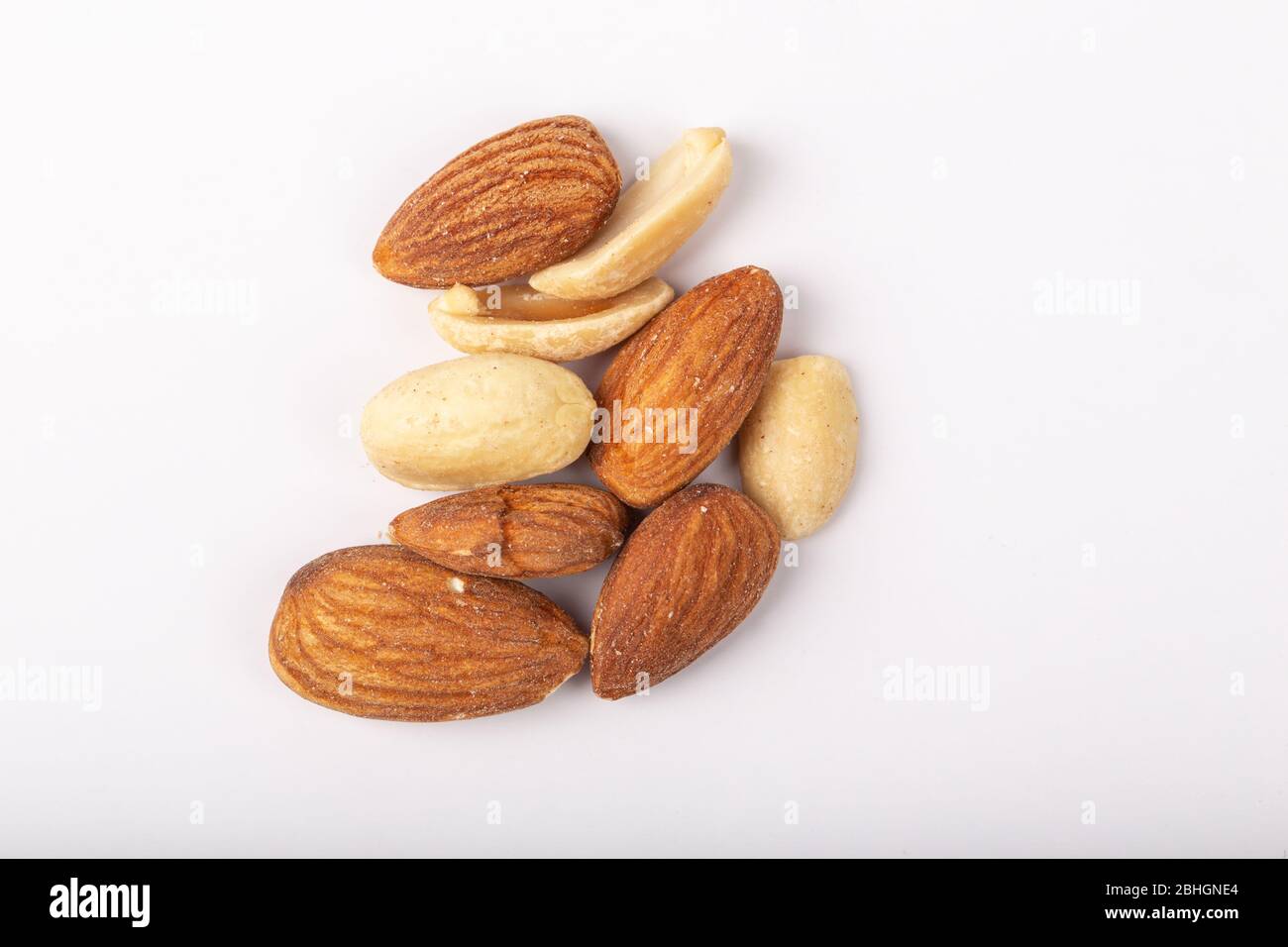 Healthy nuts on White Background. Nuts are a snack food consisting of ...