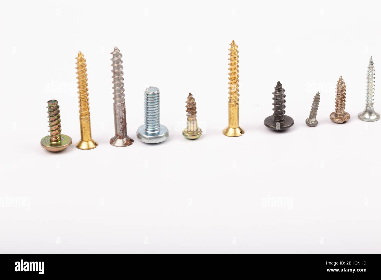 different set screws in a row on white background Stock Photo - Alamy