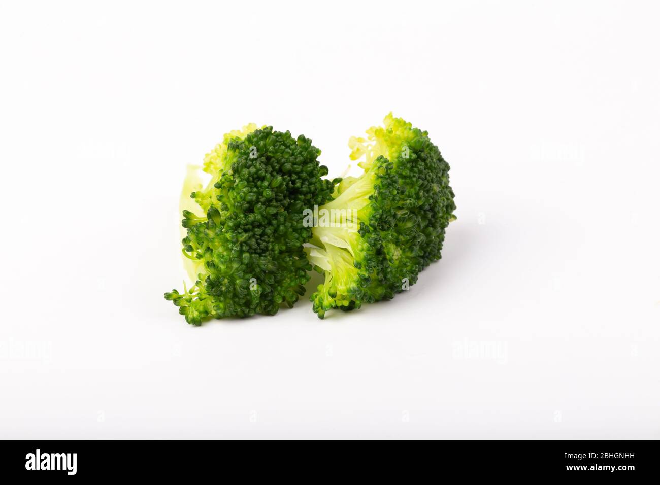 Cooked fresh broccoli isolated on white background Stock Photo - Alamy