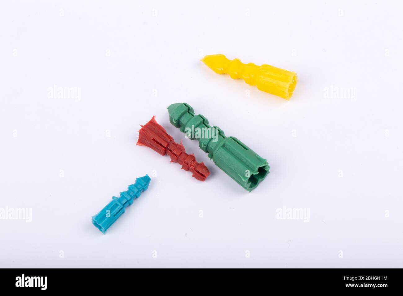 Plastic wall plug for fastener screw on white background Stock Photo ...