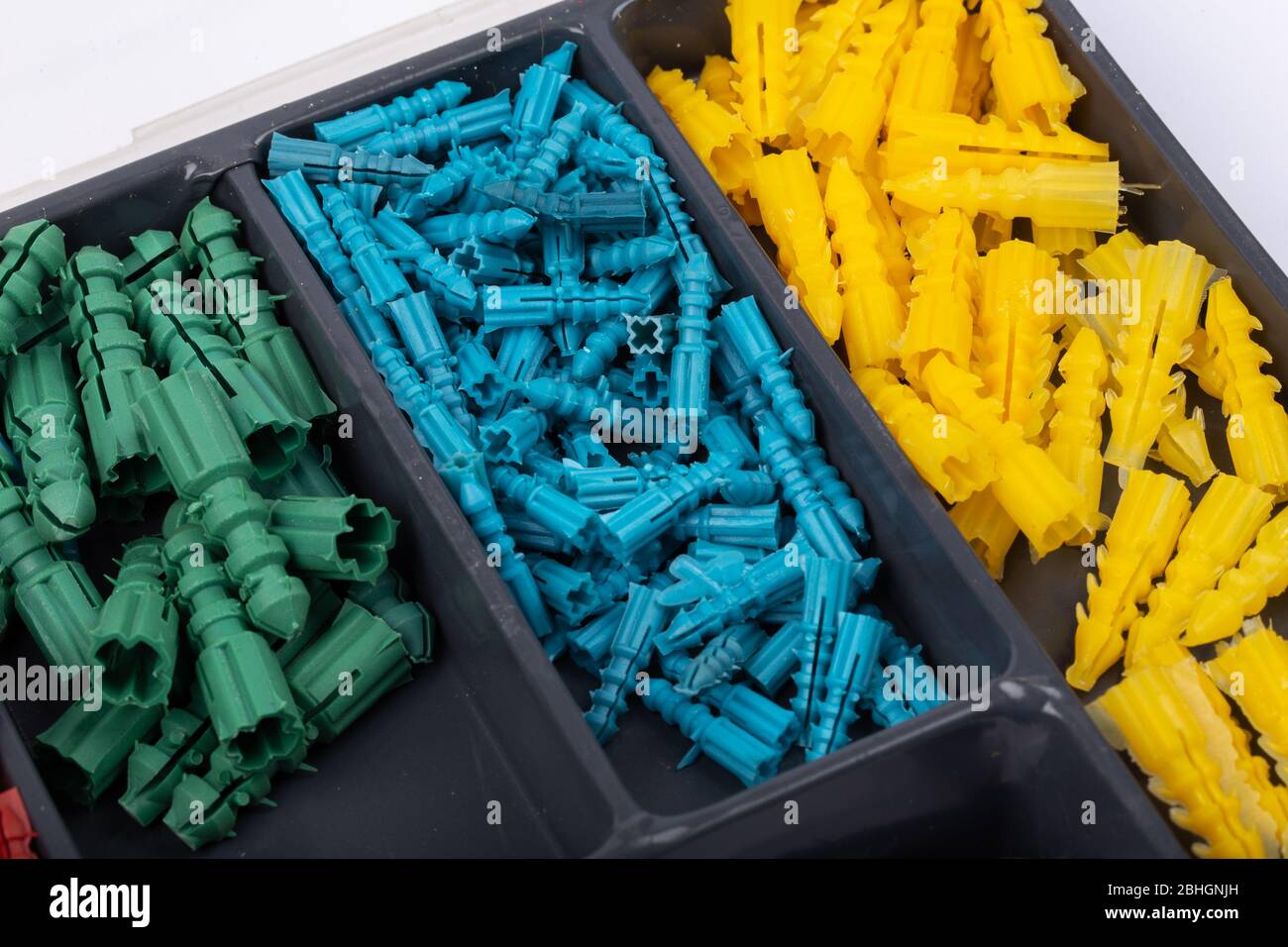 Plastic wall plug for fastener screw on white background Stock Photo ...