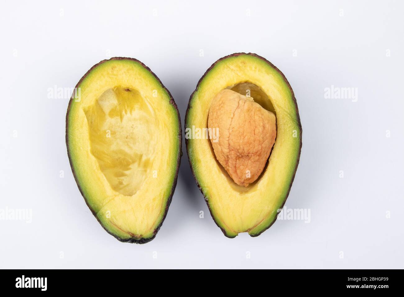 Ripe avocado isolated on white background Stock Photo - Alamy