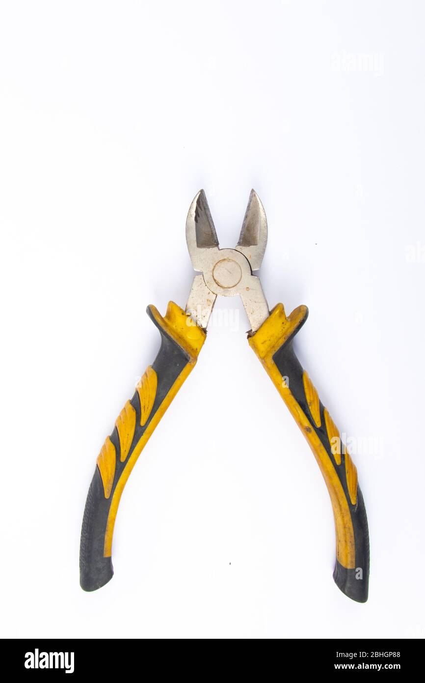 Side cutters with yellow and grey handle on white background Stock ...