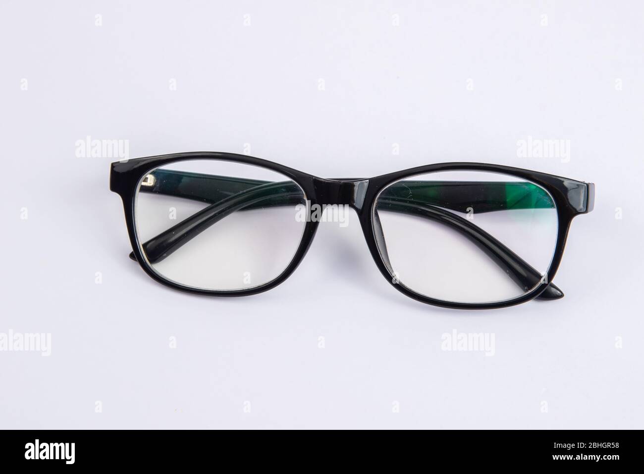 Close up black eye glasses isolated on white background Stock Photo - Alamy