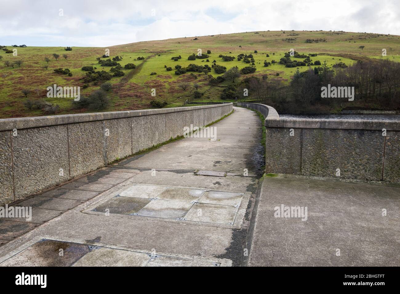 The walkway across the top of Meldon Dam is used by walkers to cross ...