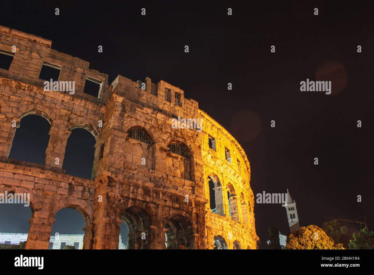 Ancient Roman Amphitheater at night in Pula, Istrian Peninsula in ...