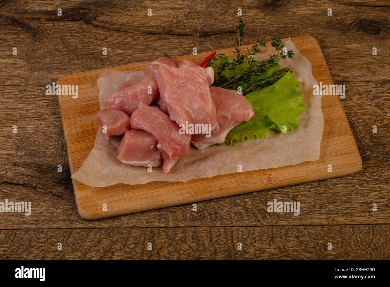 Raw pork meat heap for roast Stock Photo - Alamy