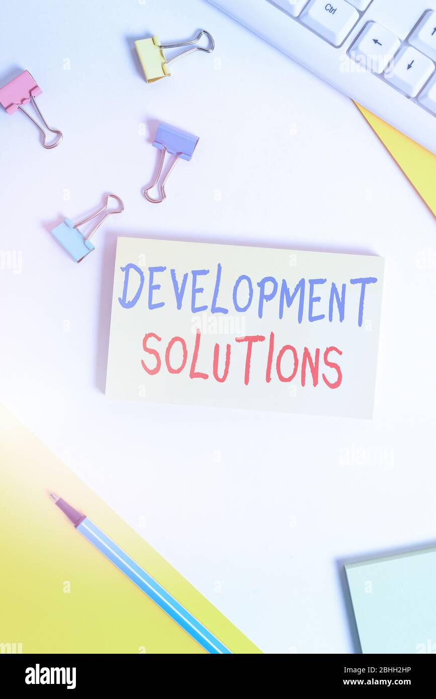 Conceptual hand writing showing Development Solutions. Concept meaning Efficient Planning based ...