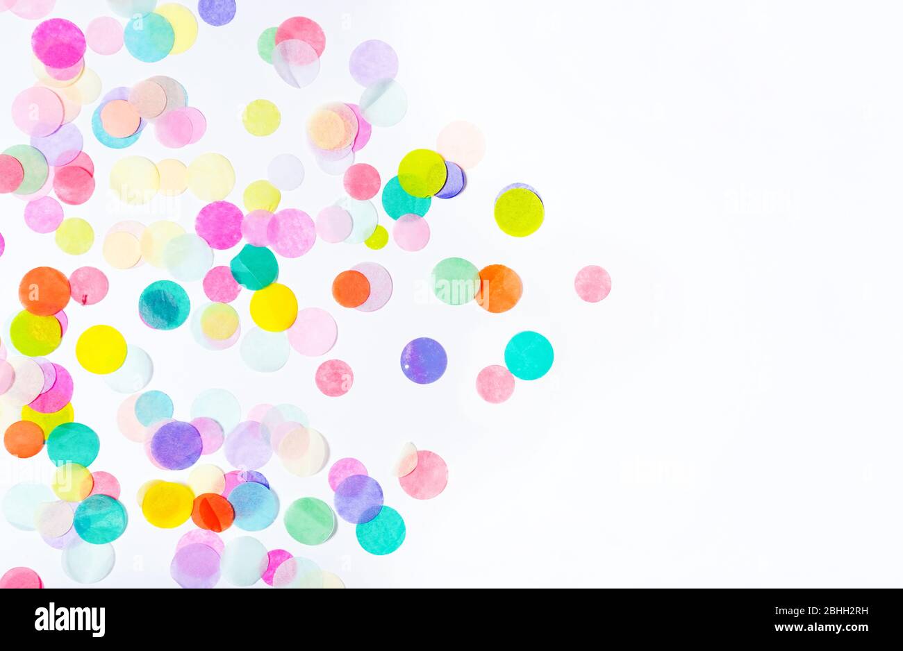 Colorful paper confetti composed as an arrow Stock Photo - Alamy