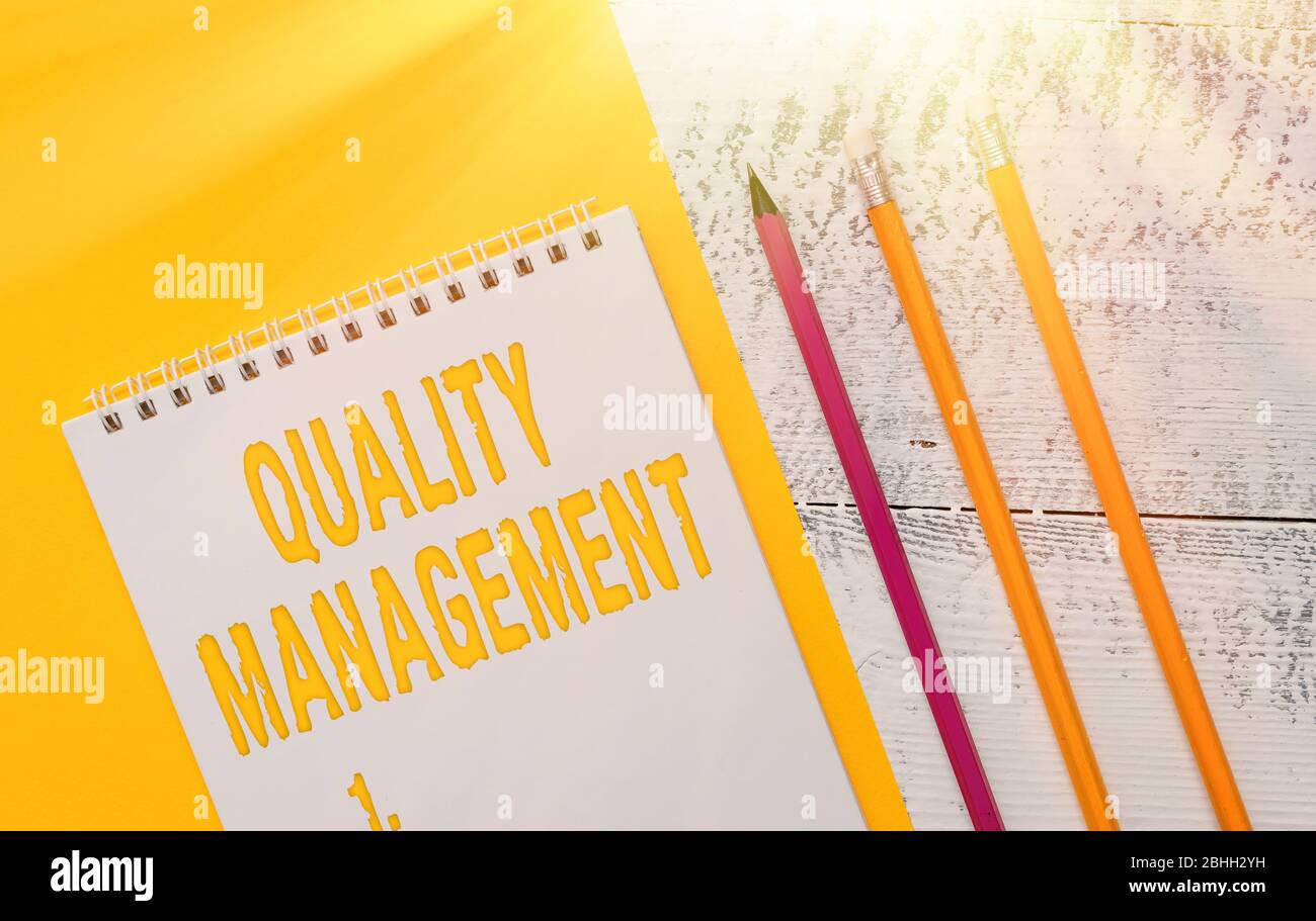 Handwriting text Quality Management. Conceptual photo Maintain ...