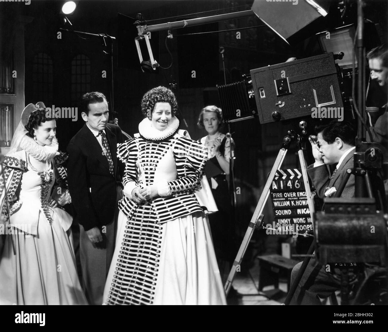 VIVIEN LEIGH and FLORA ROBSON on set candid with Director WILLIAM K ...