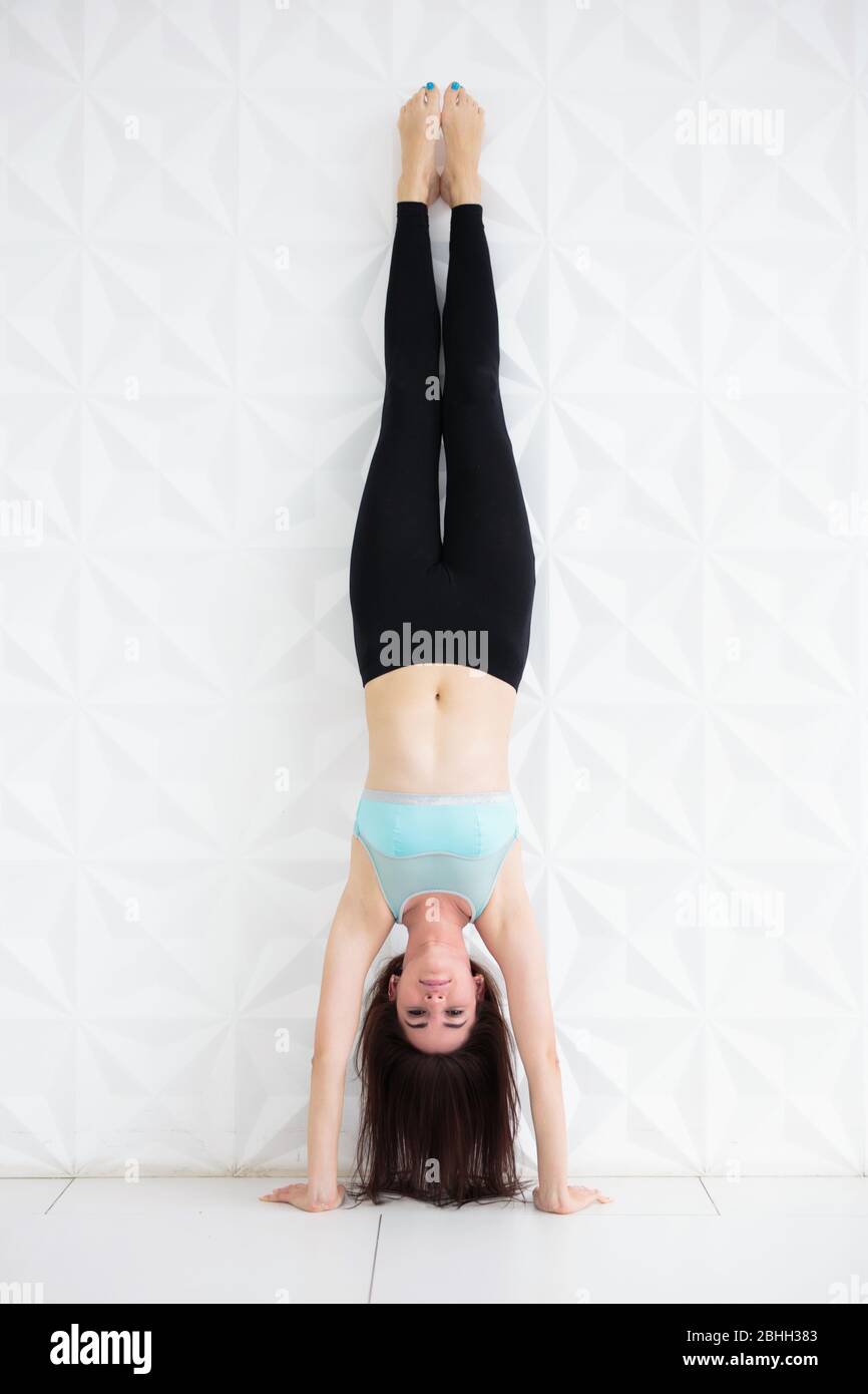 Female doing a handstand hi-res stock photography and images - Alamy