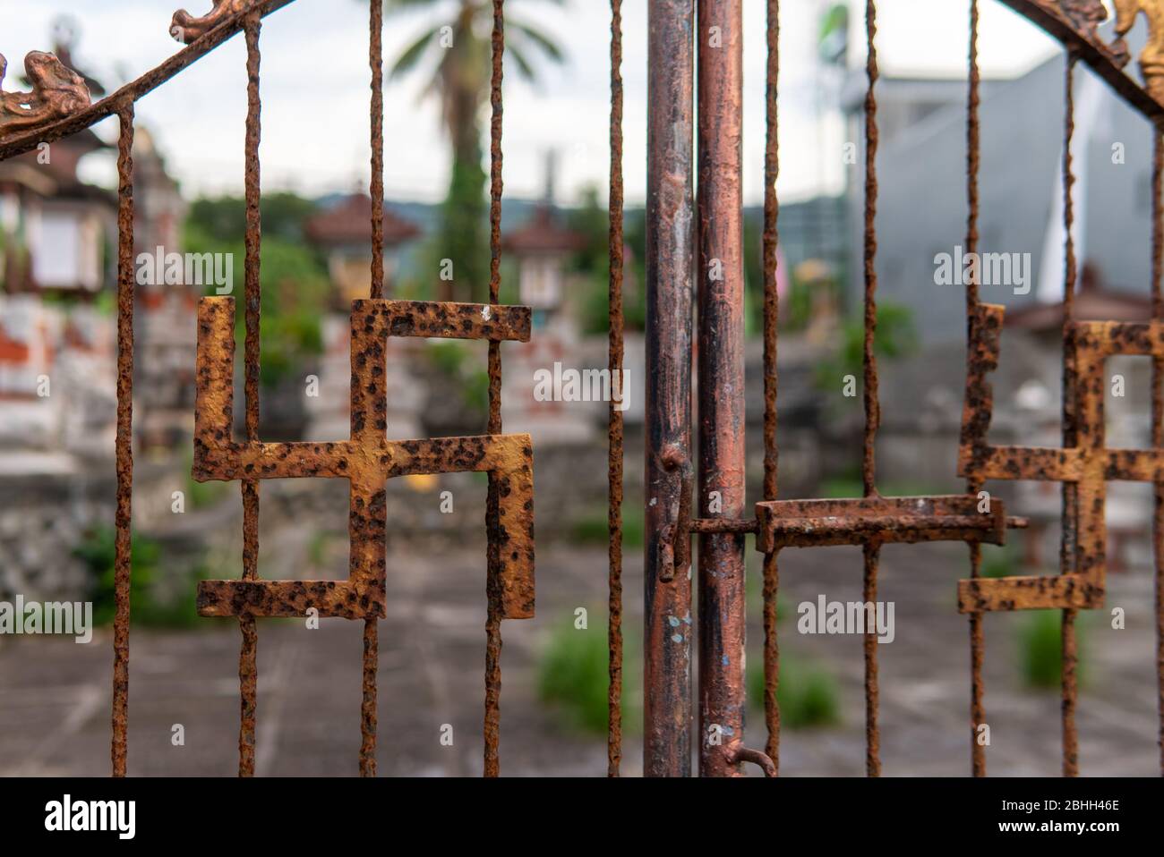 Rusted Hindu Swastika on Fence in Bali Stock Photo - Alamy