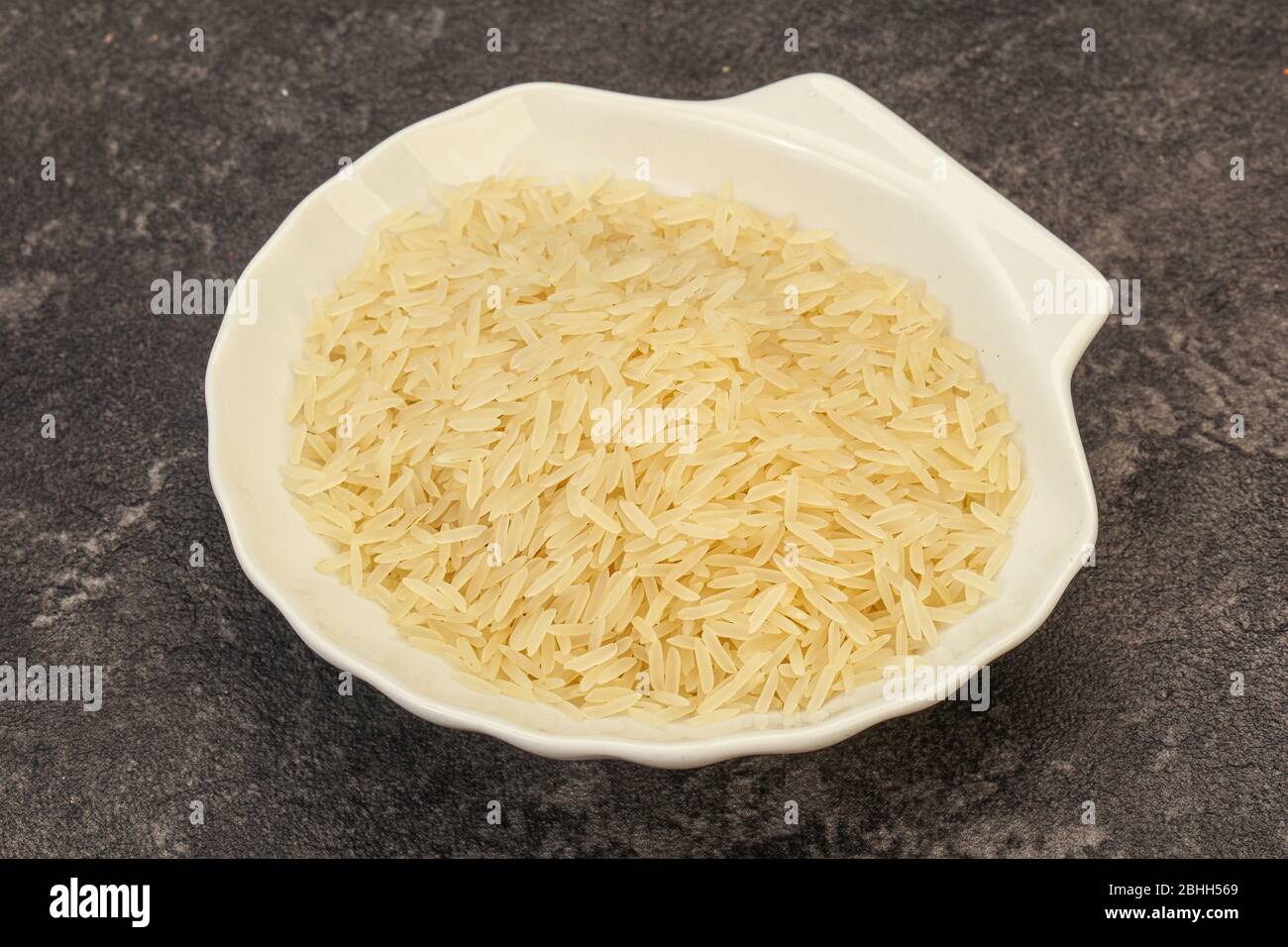 Raw Indian basmati rice in the bowl Stock Photo - Alamy