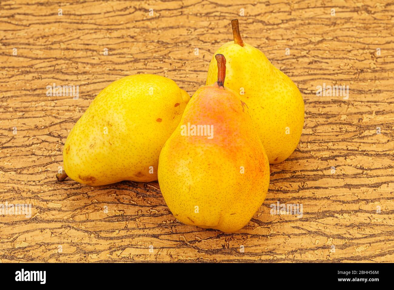 Fresh sweet yellow pear over background Stock Photo - Alamy