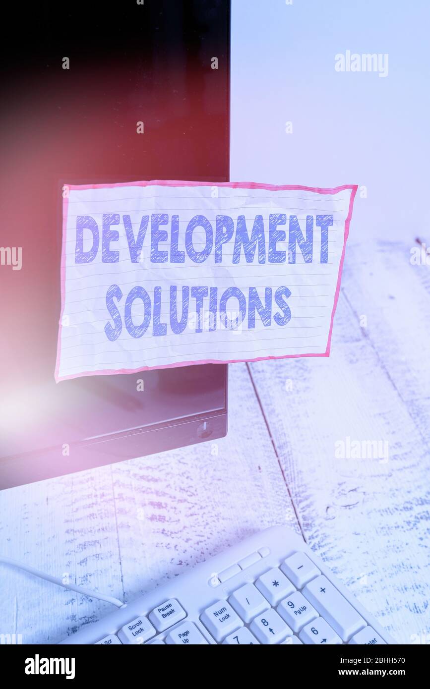 Conceptual hand writing showing Development Solutions. Concept meaning Efficient Planning based ...