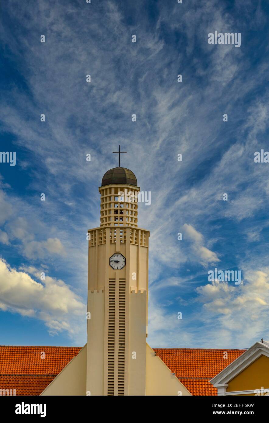 Church Clock Over Orange Roof Stock Photo - Alamy