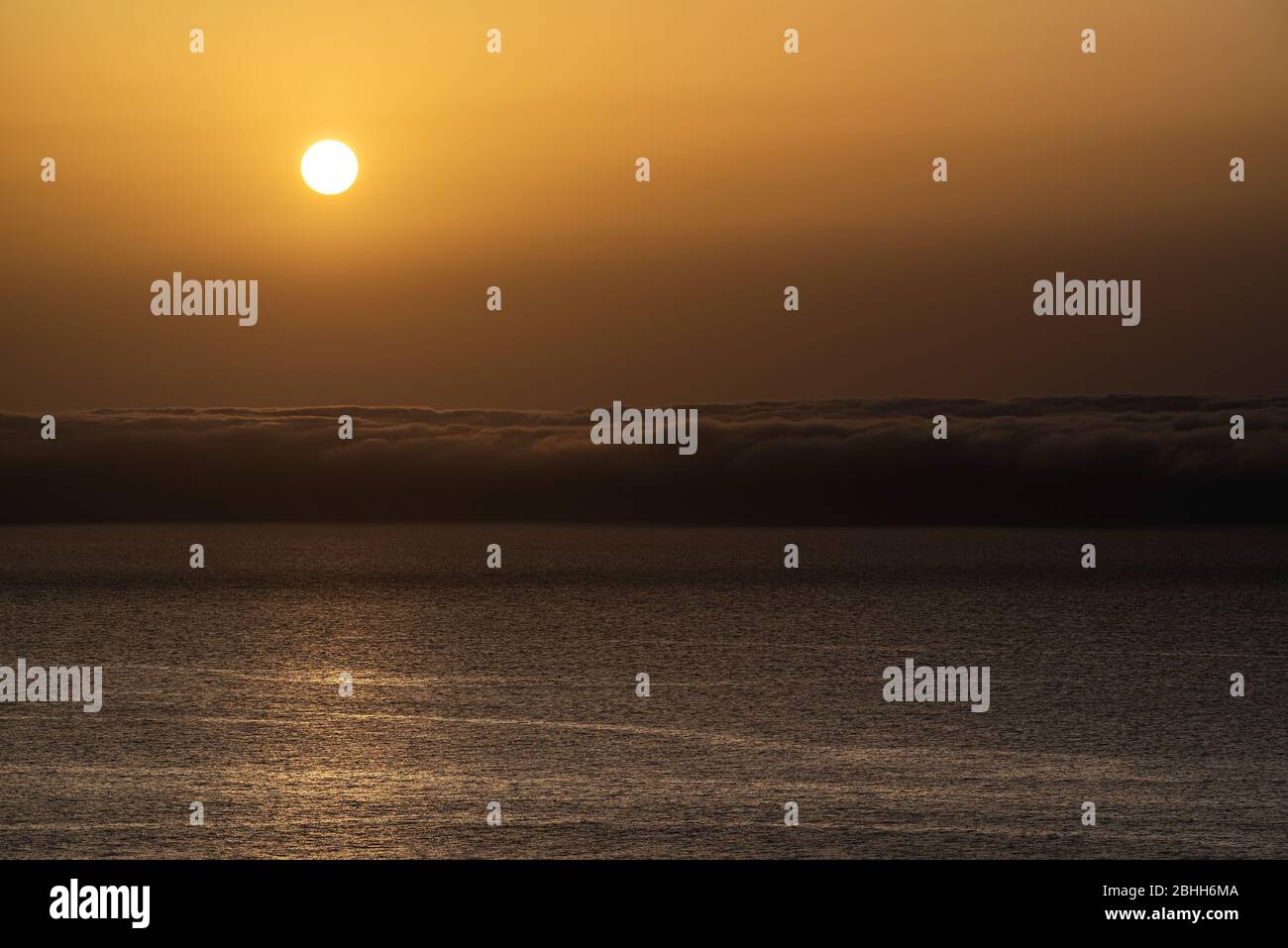 Ligurian sea as the sun starts to rise and colour it golden, Liguria ...