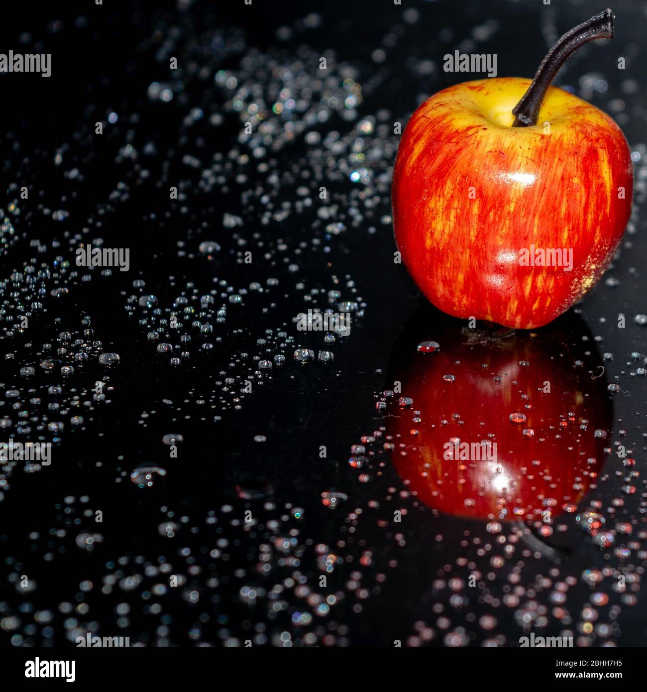 red apple with water drops Stock Photo - Alamy
