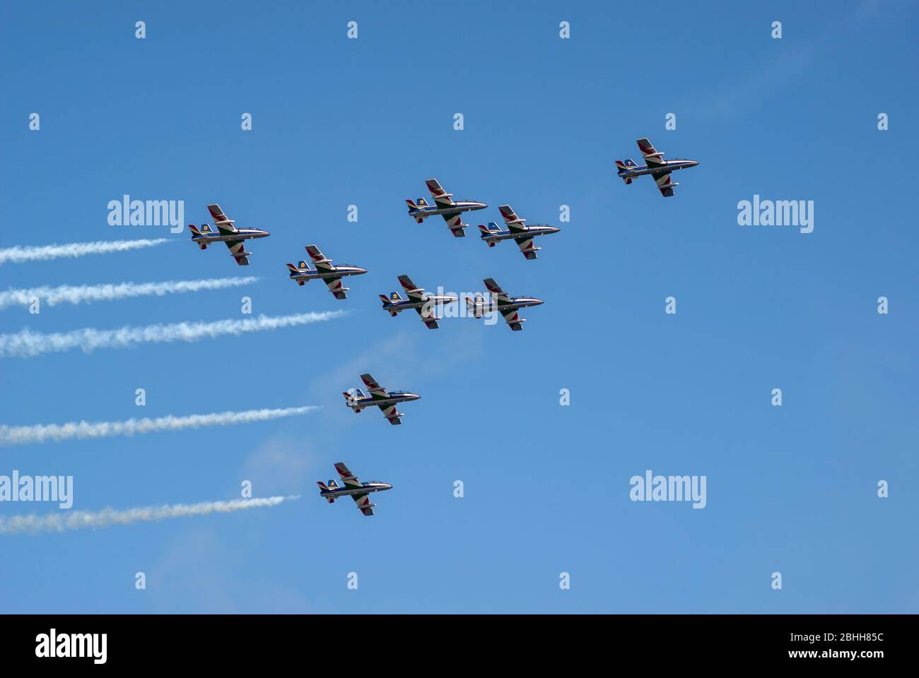 Squadron of military airplanes flying in formation Stock Photo - Alamy