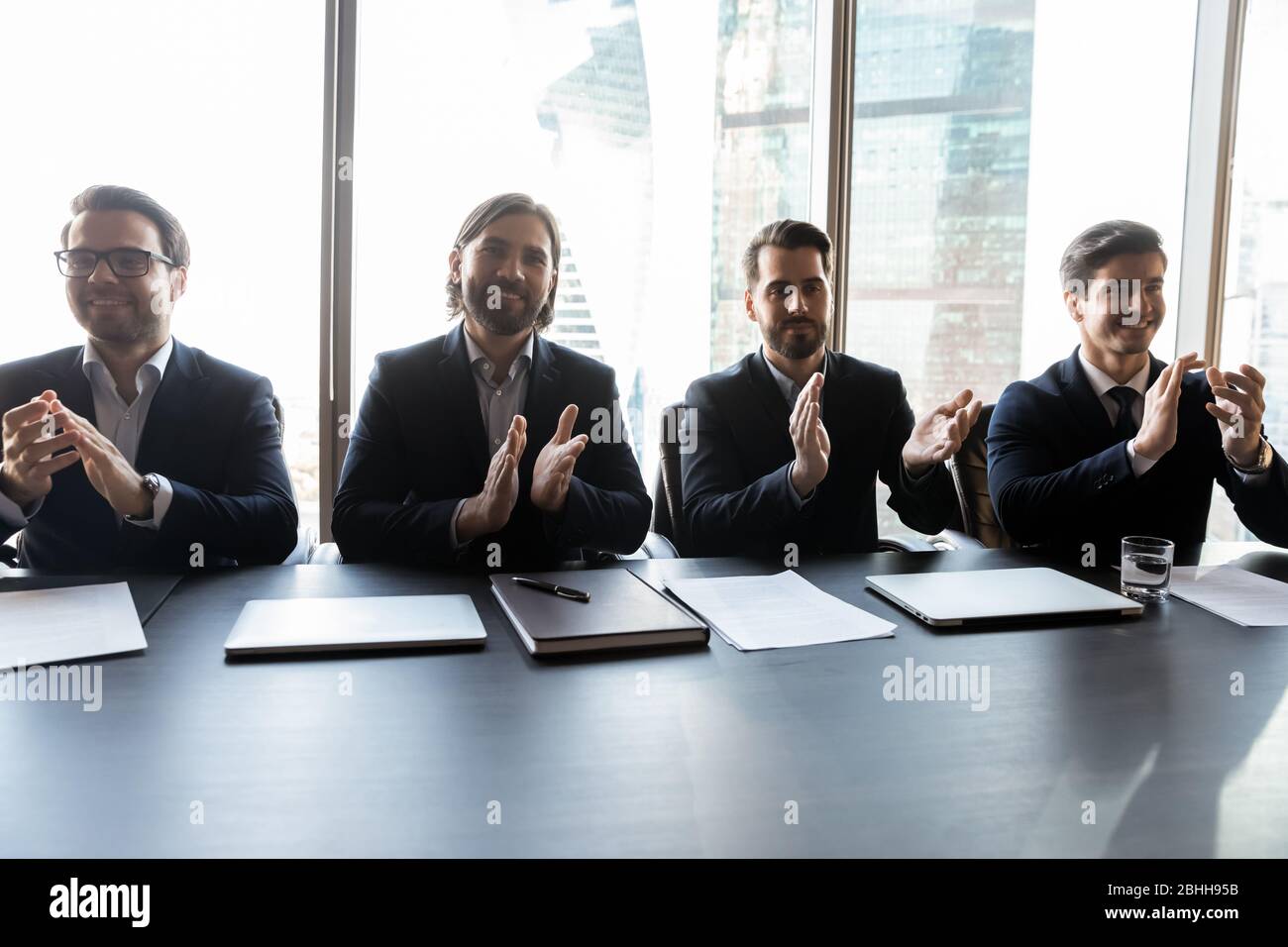 Four human hands hi-res stock photography and images - Alamy