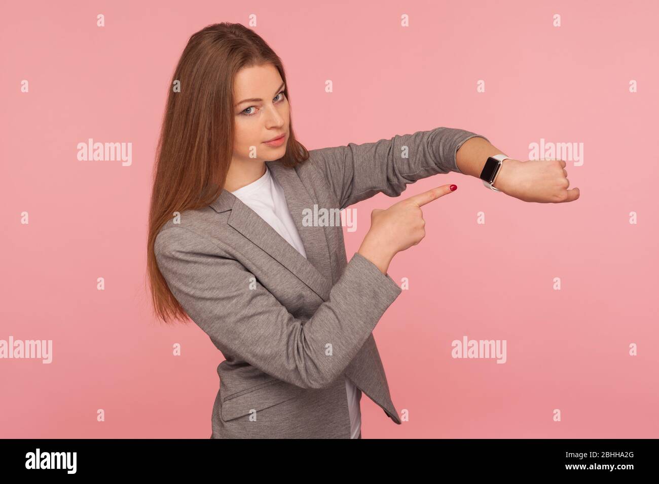 Rush, hurry up to come in time! Portrait of worried busy lady in ...