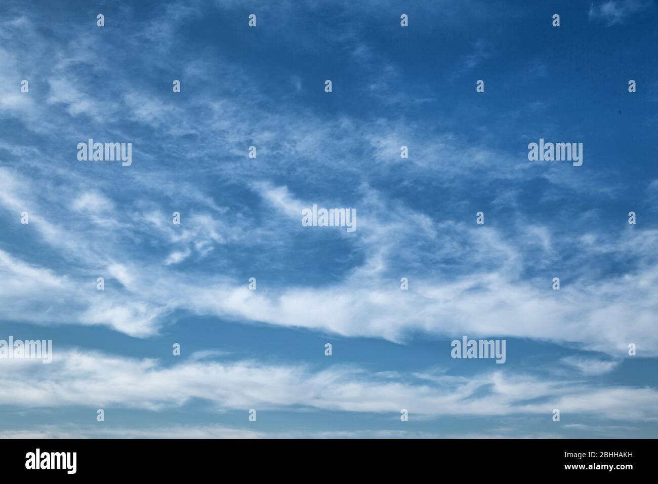 blue sky background with white long clouds Stock Photo - Alamy