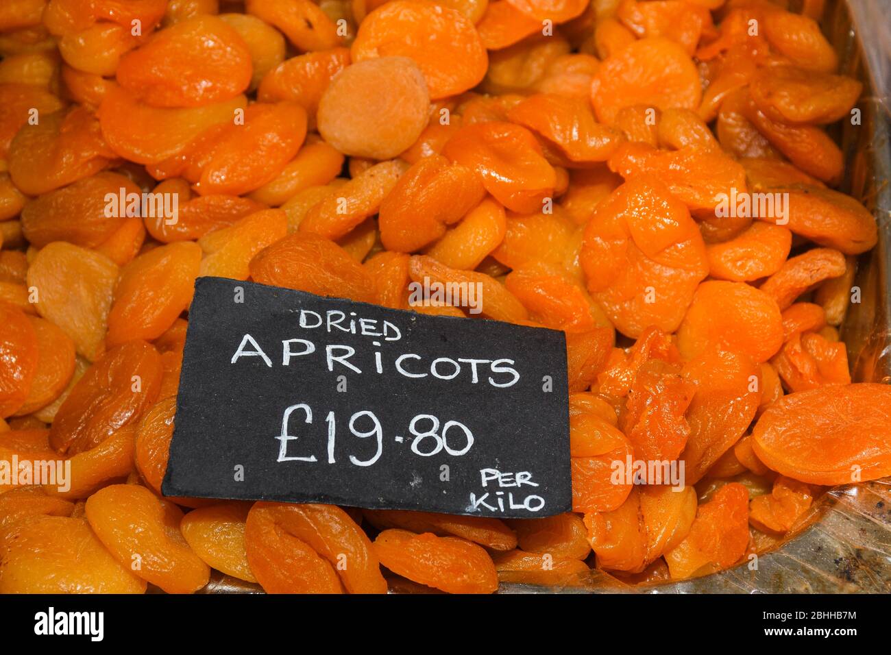 Dried apricots background, tropical fruits preservation in markets for ...