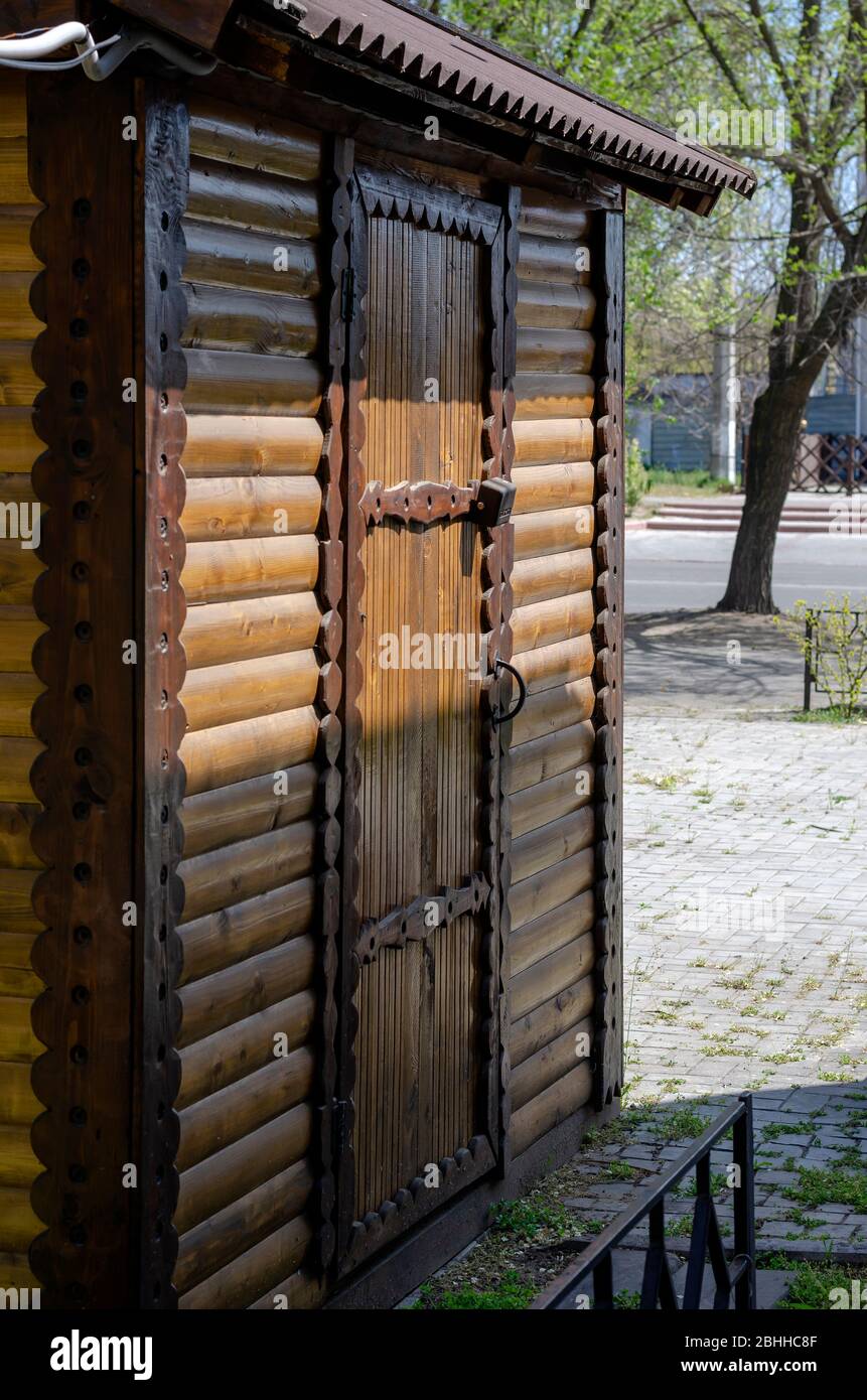 Closed wooden stall. The back of a stylized street kiosk. Street ...