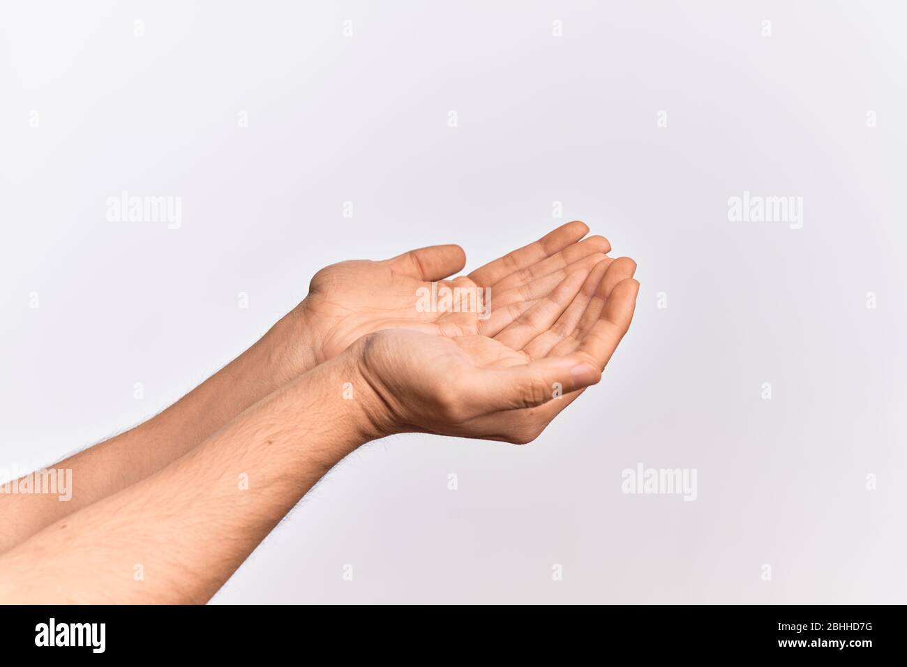 Hand of caucasian young man showing fingers over isolated white ...