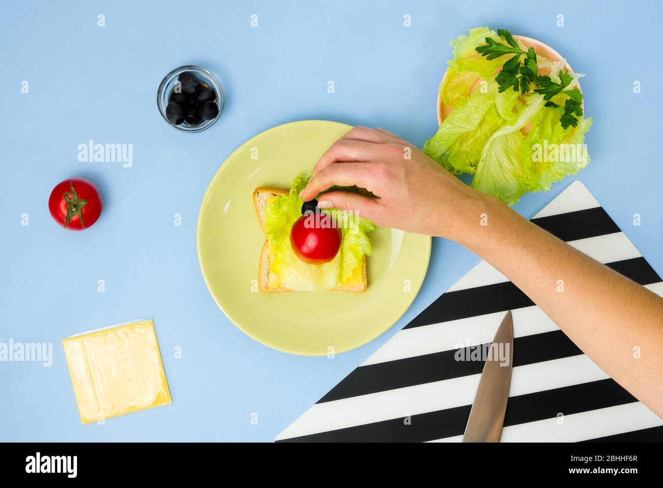 Fun food art for kids. Ladybug sandwich on blue background. How to make ...